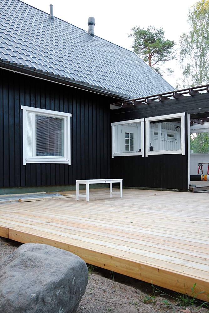 Maalari maalasi taloa, mustaa ja valkoista – Design Wash